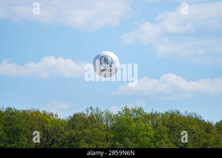 White helium balloon over trees marked Info Stock Photo - Alamy