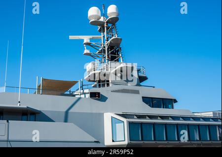 Side bridge and mast of a large grey yacht Stock Photo - Alamy