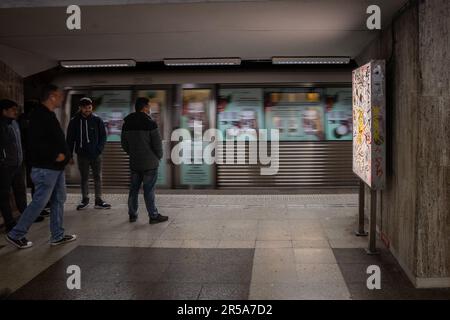 Picture of a metro of Bucharest Metro, on Line 2, with people waiting ...