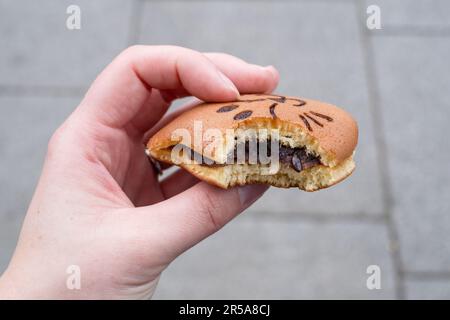 Red bean paste bun in the shape of a cat's head, Tokyo, Japan Stock ...