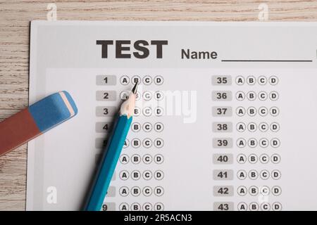 Pencil on answer sheet, top view. Student passing exam Stock Photo - Alamy