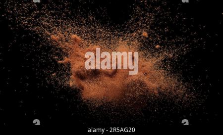 orange particles flying, colored powder in the air, isolated on black ...