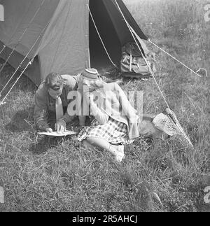 Camping in the 1940s. A campsite where people spend parts of their ...