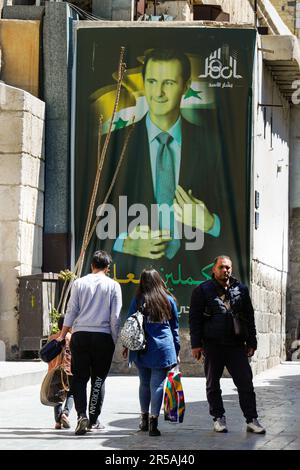 Large posters with the portrait of President Bashar al-Assad in ...