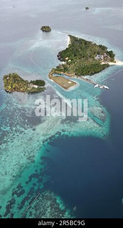 A stunning panoramic view of a cluster of small islands surrounded by ...