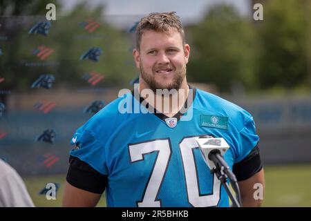 Carolina Panthers guard Brady Christensen (70) and defensive end Jared ...