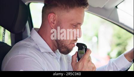 Breathalyzer Alcohol Test In Car. Man Taking Breath Test Stock Photo ...