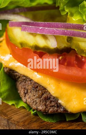Gluten Free Paleo Bunless Cheeseburger with Lettuce and Tomato Stock ...