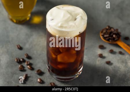Cold Oleato Olive Oil Iced Coffee in a Cup Stock Photo - Alamy