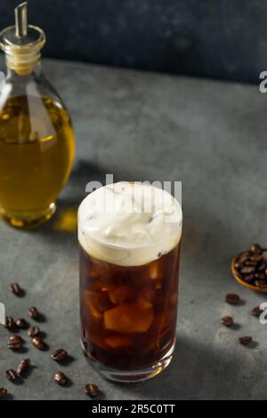 Cold Oleato Olive Oil Iced Coffee in a Cup Stock Photo - Alamy