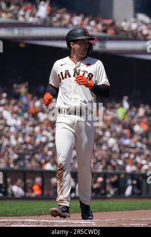 San Francisco Giants' Patrick Bailey, right, scores past St. Louis ...