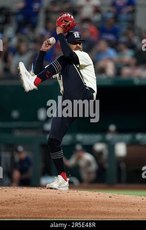 Texas Rangers relief pitcher Grant Anderson winds up to throw to the ...