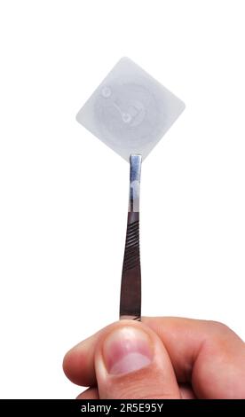 hand holding rfid tags, close up Stock Photo - Alamy