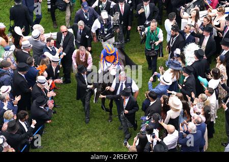 Ryan Moore celebrates winning the Betfred Derby with Auguste Rodin ...