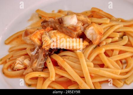 Scialatielli with grouper. Italian pasta dish, Apulian cuisine Stock ...