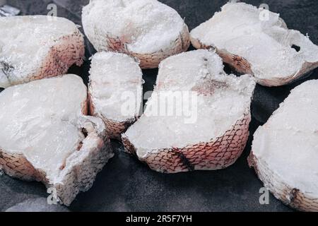 Macrourus fish frozen, fresh, sliced and cut in portions. Gray ...