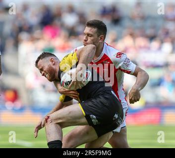 Hull KR's Joe Burgess is tackled during the Betfred Super League Grand ...