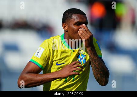 Brazil's Douglas Mendes tries to stop his nose from bleeding during a ...