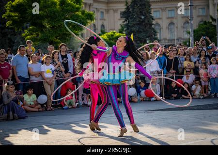 Artists of the Metropolitan Circus offer a street performance in ...