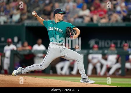 Seattle Mariners starting pitcher Bryan Woo winds up to throw to the ...