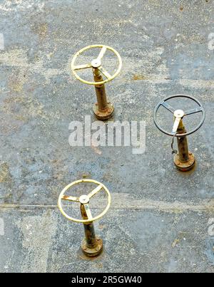 Black and Yellow Pipes and Valves on Refueling Barge Stock Photo - Alamy