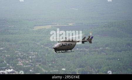 An Alaska Army National Guard LUH-72 Lakota helicopter flies alongside ...