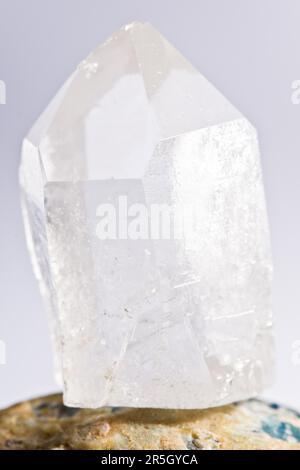 White luminous mountain crystal quartz with white background Stock ...