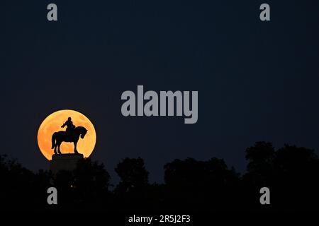 Moonrise behind the equestrian statue of Jan Zizka at Vitkov in the ...