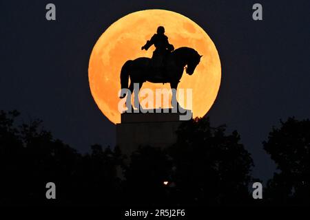 Moonrise behind the equestrian statue of Jan Zizka at Vitkov in the ...