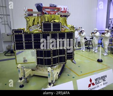 The lunar probe "SLIM" is unveiled at the Tanegashima Space Center in ...