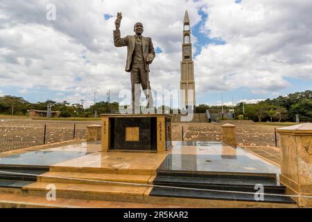 Statue of DR Kamuzu Hastings Banda in front of the Memorial tower to ...