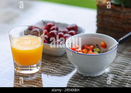 Summer breakfast. Diet and healthy food. Baked omelet with tomatoes on ...