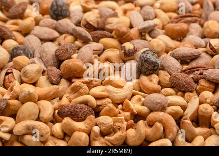 Mix of tasty salty nuts. A group of almonds, pistachios, walnuts ...