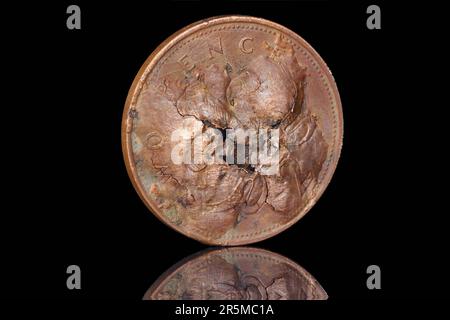 A damaged 2 pence coin that has blistering to the reverse side Stock ...