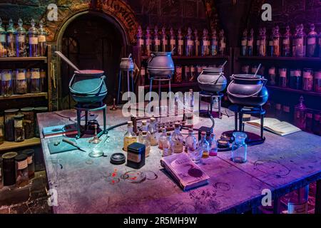 Potion making equipment on a desk in the potions lab set at Hogwarts ...