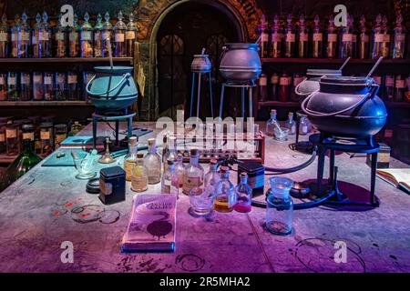 Potion making equipment on a desk in the potions lab set at Hogwarts ...