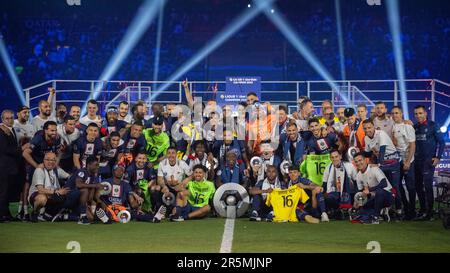 Paris Saint-Germain players celebrate with the trophy during the UEFA ...