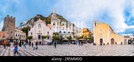 Belvedere Piazza IX Aprile with street cafe, clock tower and church of ...