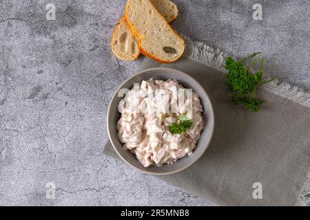 Traditional German meat salad with pickled cucumbers. Top view Stock ...