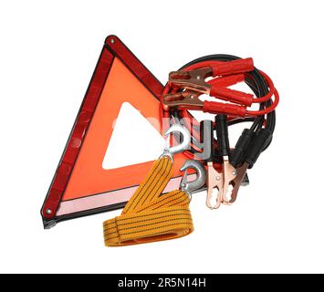 Emergency warning triangle and towing strap on white background. Car ...