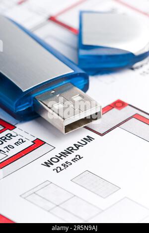 Data carrier usb on a design and plan for a house Stock Photo - Alamy
