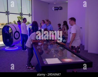 Nicosia, Cyprus. 4th June, 2023. A woman views a piece of meteorite ...