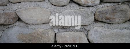 Neatly stacked rough cut stone wall seamless texture background Stock ...