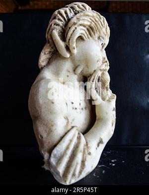 This marble statue shows the god Pan instructing the youth Daphnis in ...