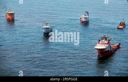 Aerial view of the ships surrounded by oily water in the Gulf of Mexico ...