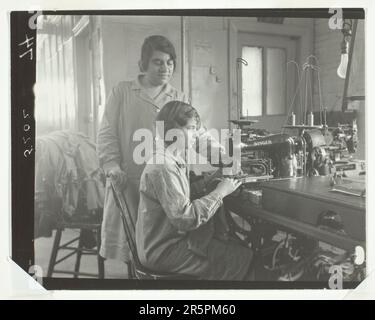Vintage 1900s Factory work women in the lock and drill department ...
