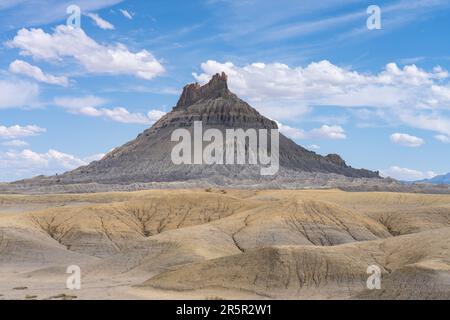 North view of Factory Butte and its surrounding badlands in the ...