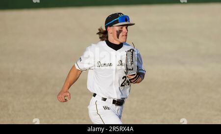 Wake Forest's Tommy Hawke (24) dives for a ball hit to center field by ...
