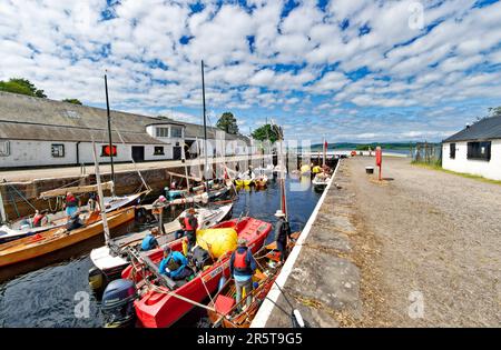 Inverness Scotland flotilla of boats in early summer sailing towards ...