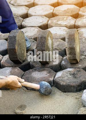 Construction site of pavement octagon bricks road. Installation or ...